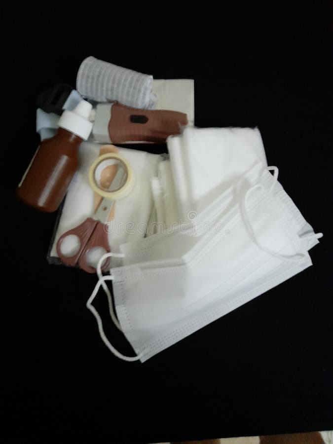First aid kit and mask stock image. Image of dress, paper - 200539741