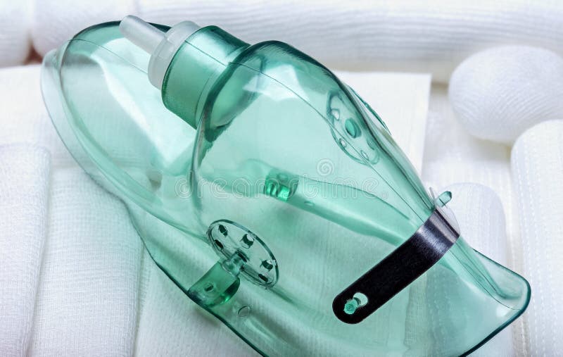 First Aid Kit with Medical Bandages and Oxygen Mask Stock Photo - Image ...