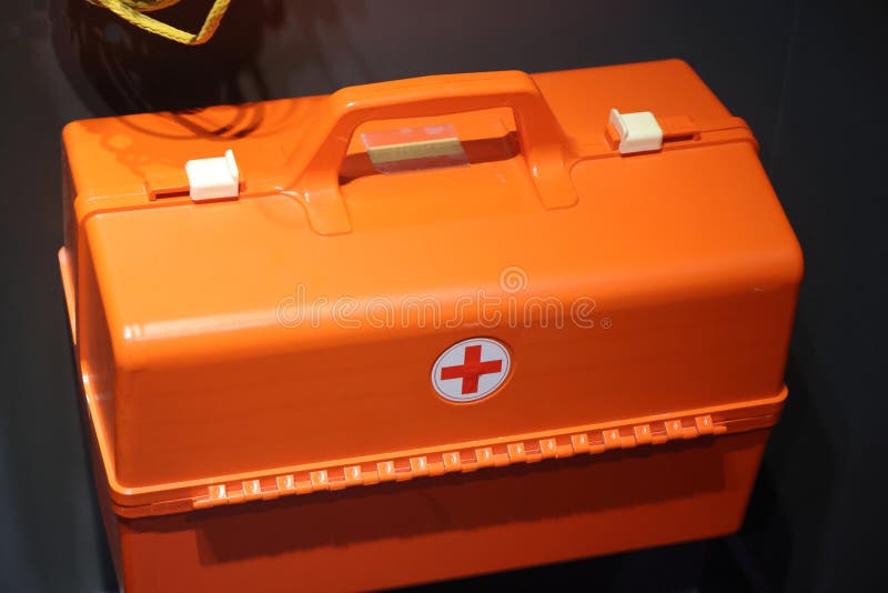 First Aid Kit, Orange Container with a Cross. Portable Basic First Aid ...