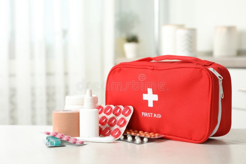 First Aid Kit with Pills Minimalism. Concept of First Aid in Case of ...