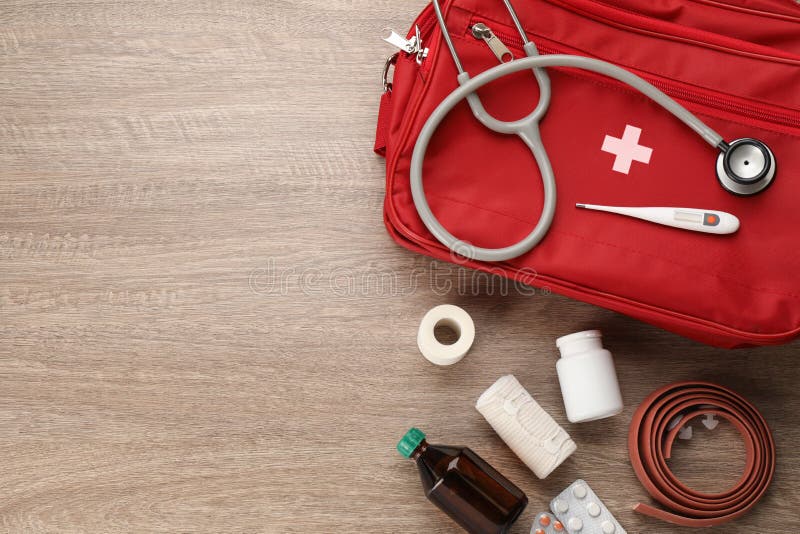 First Aid Kit on Wooden Table, Flat Lay. Space for Text Stock Image ...