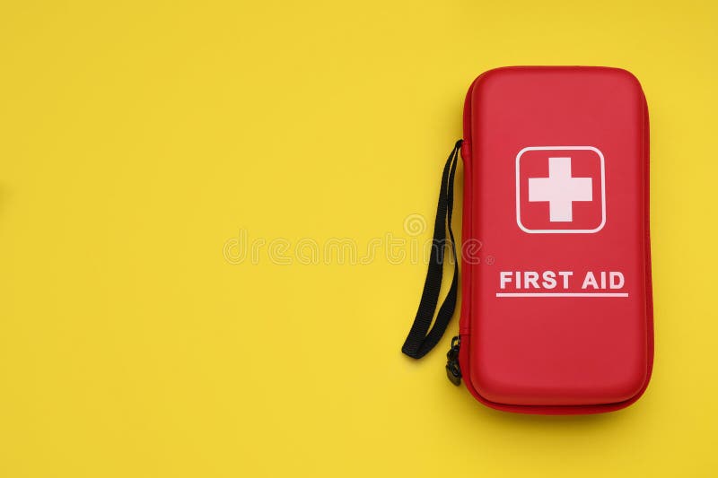First Aid Kit on Yellow Background, Top View and Space for Text Stock ...