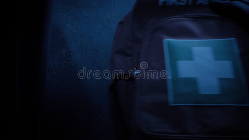 First Aid Pack is Picked Up or Put Down in the Dark Stock Video - Video ...