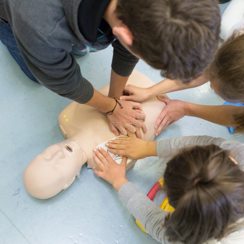 First Aid Resuscitation Course Using AED. Stock Photo - Image of kids ...