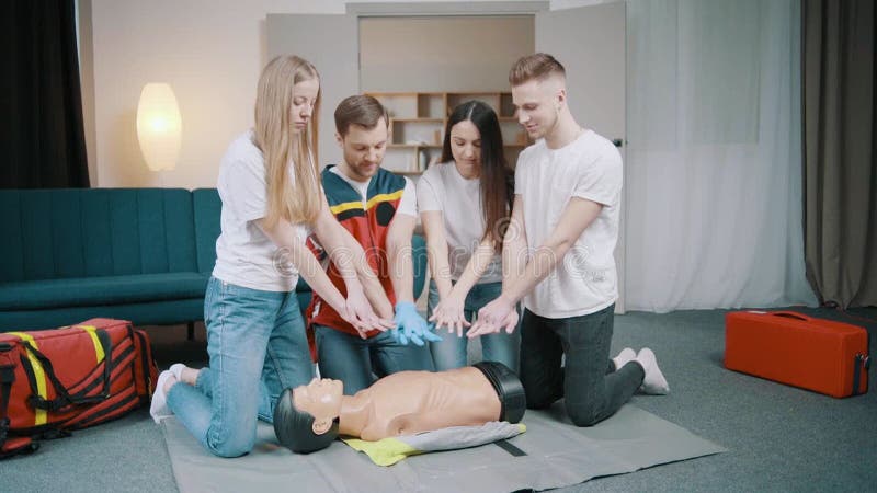 First Aid Resuscitation, CPR Training. Students Study in Front of a ...