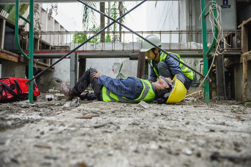 First Aid Support Accident at Work of Builder Worker in Construction ...