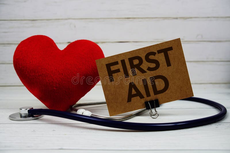 First AID Text Message on Paper Card with Stethoscope on Wooden ...