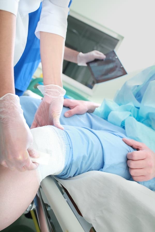 First Aid To the Patient in ER Stock Photo - Image of background, knee ...