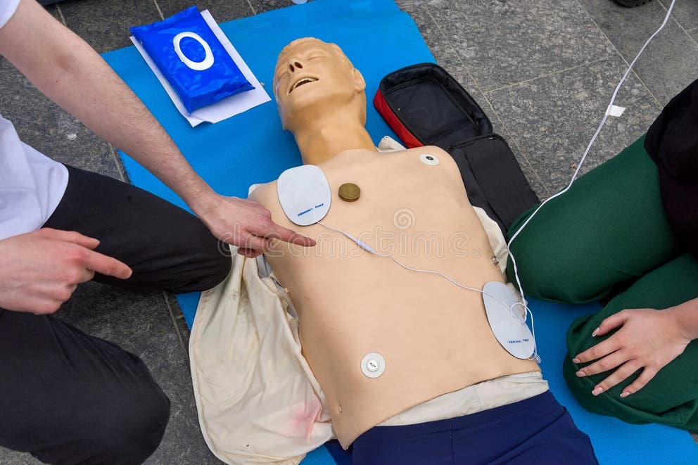 First-aider Practicing Chest Compressions Stock Image - Image of ...