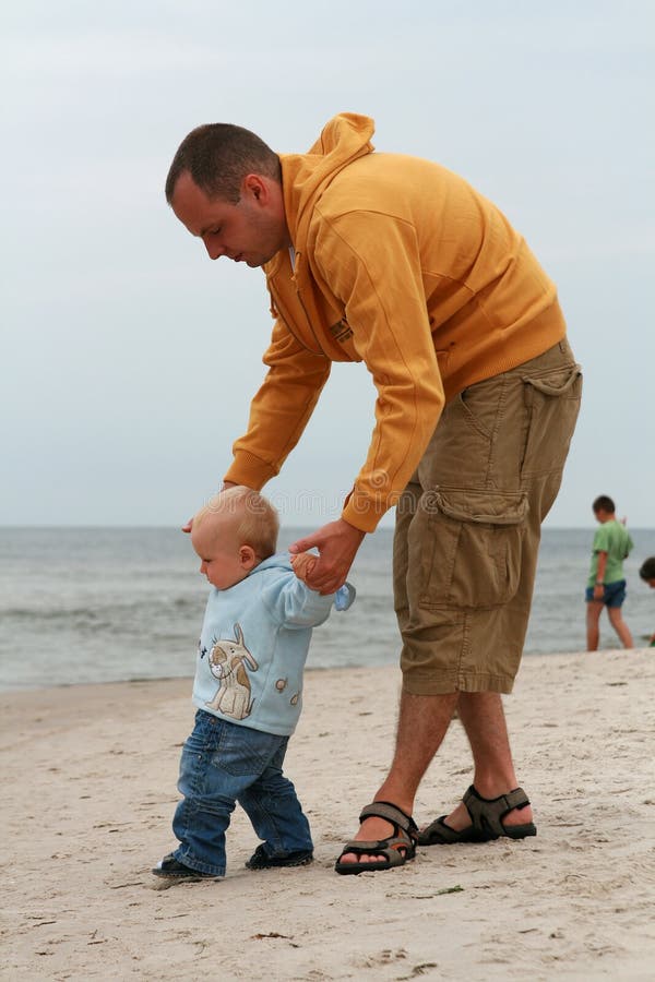 Feet on Sand - First Baby S Step Stock Photo - Image of foot, family ...