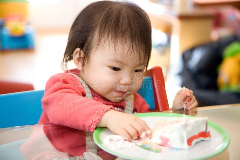 First Birthday Cake stock photo. Image of asian, hands - 4308994