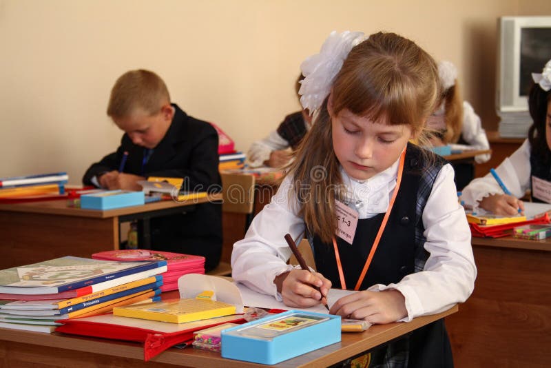 First Class Children Write in Class Editorial Image - Image of sitting ...