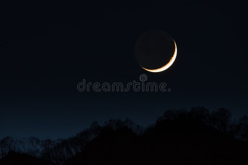 First crescent moon stock photo. Image of waning, night - 64985042