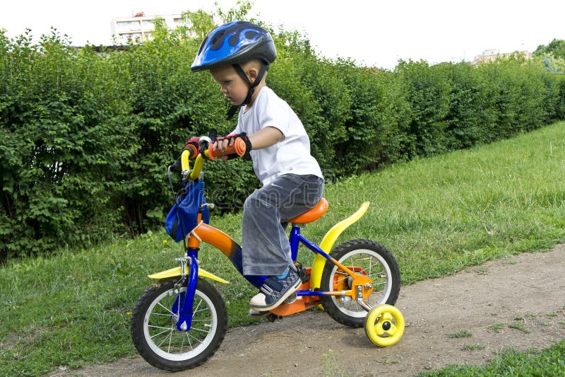 Learning To Ride on a First Bike Stock Photo - Image of learn, cycle ...