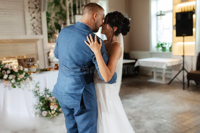 The First Dance of the Bride and Groom Inside a Restauran Stock Photo ...