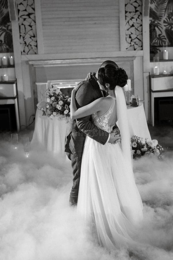 The First Dance of the Bride and Groom Inside a Restauran Stock Photo ...