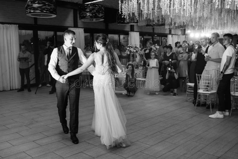 The First Dance of the Bride and Groom Inside a Restaurant Editorial ...