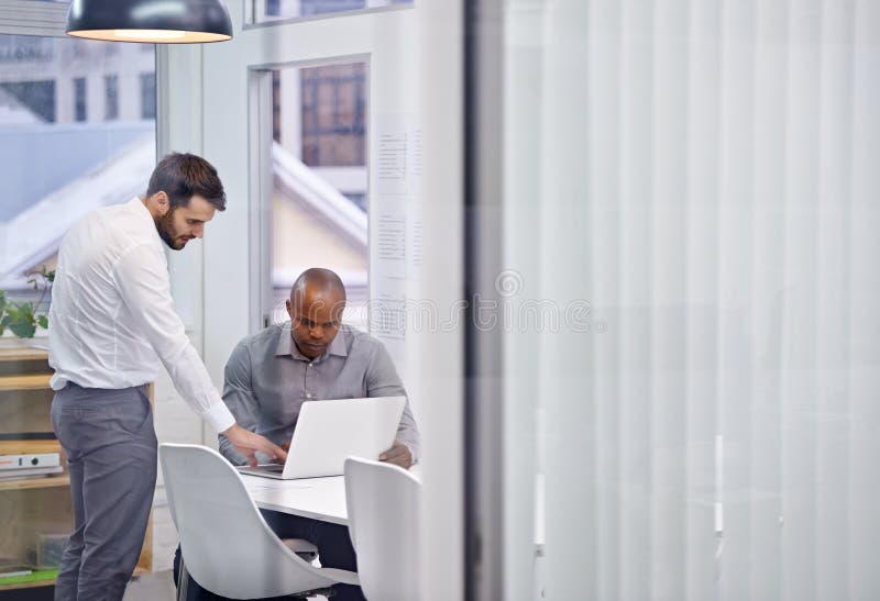 First Day on the Job. a Manager Standing in an Office while Training a ...