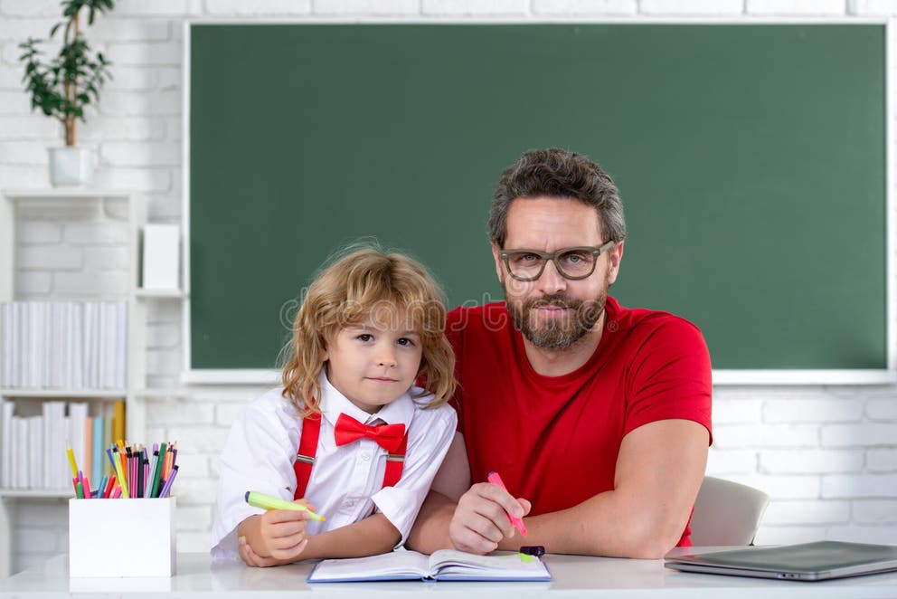 First Day at School. Cute Little Boy Studying Lesson in Class. Cute ...