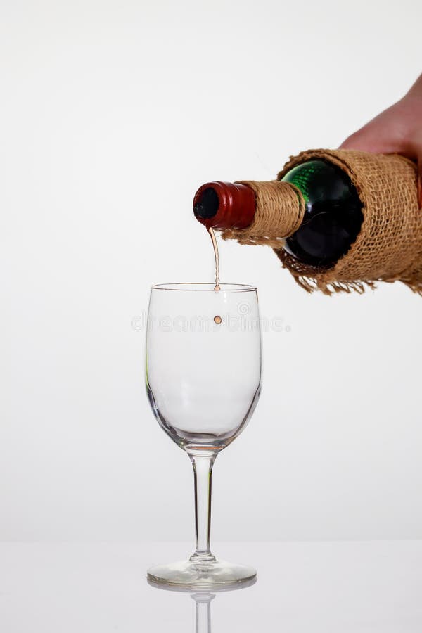 First Drop of Red Wine into Glass Stock Image - Image of liquid ...