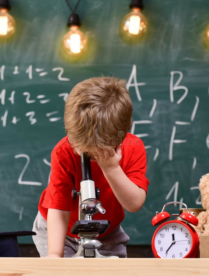 First Former Interested in Studying, Learning, Education. Kid Boy Looks ...