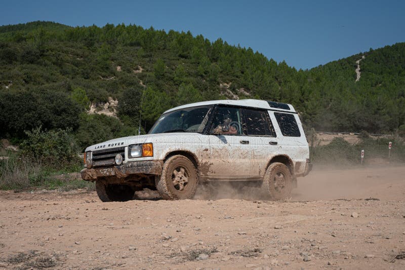 First Generation Land Rover Discovery on the Soil Surrounded by Dense ...