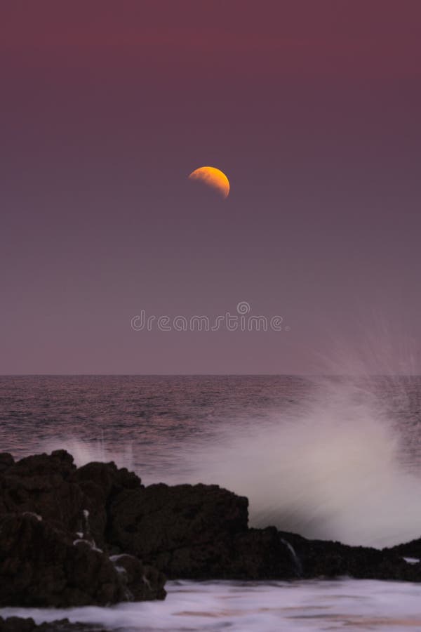First Glare of the Moon Over the Splashing Sea Water at Sunset Stock ...