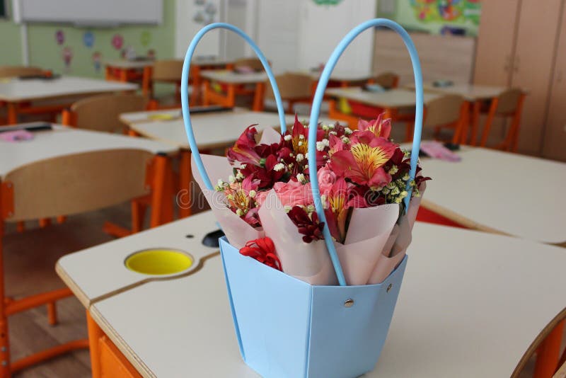 A First-grader S Classroom and a Bouquet of Flowers on the Desk Stock ...