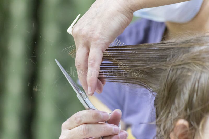 First Haircut for a Young Girl Stock Photo - Image of cutting, people ...