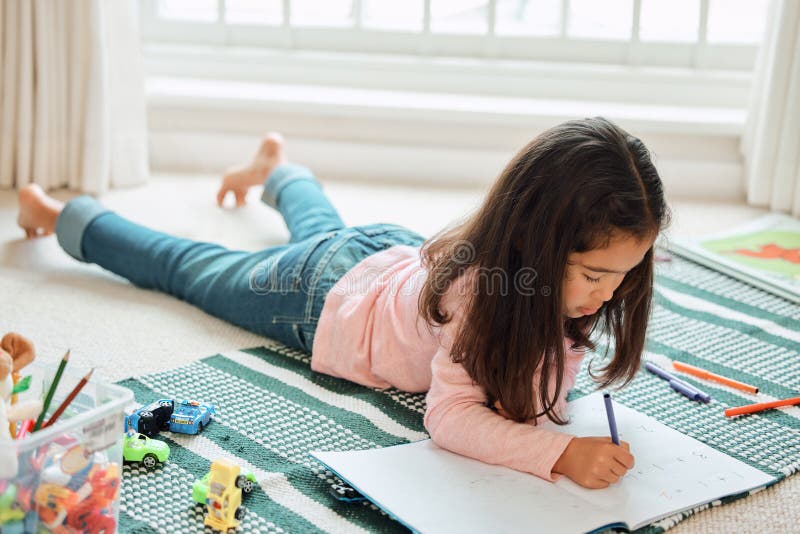 First Homework Then Play. a Little Girl Doing Homework at Home. Stock ...
