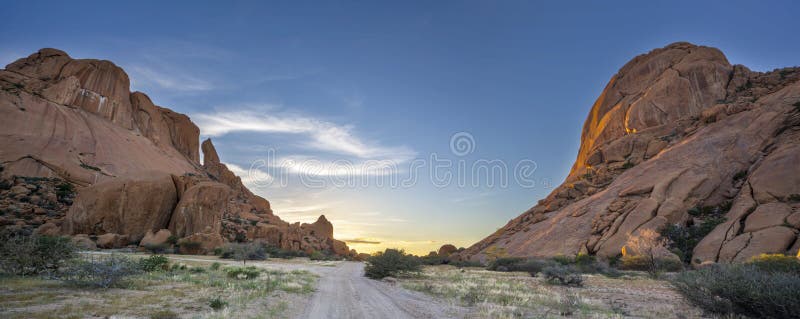 First Light of the Day Shine on Red Granite Rocks Stock Image - Image ...