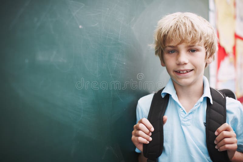First One in Class. Portrait of a Young Boy Wearing a Backpack and ...