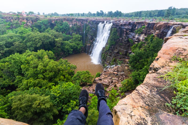 First-person View of a Person Dangling Their Legs from the Edge of a ...