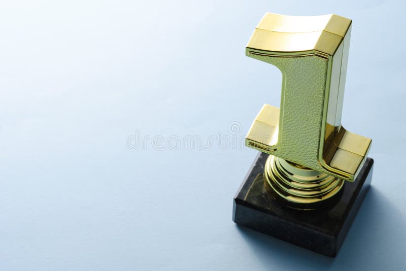 First Place Gold Metallic Champions Trophy Stock Photo - Image of award ...