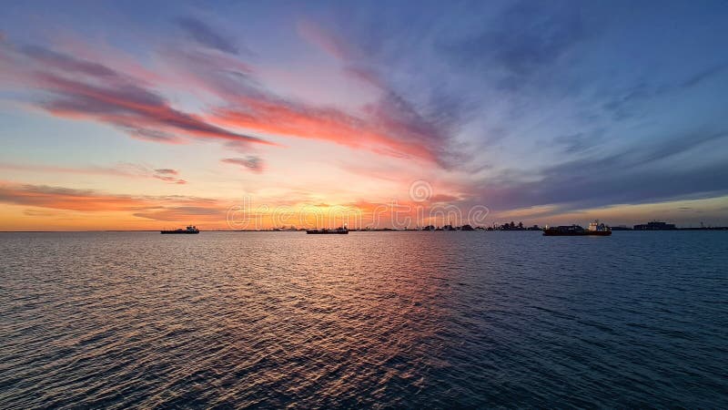 The First Rays of the Rising Sun Against the Background of Distant ...