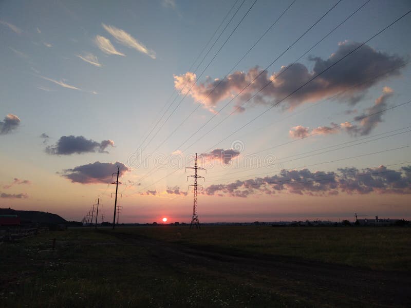 Sunrise in the Russian Steppes Stock Photo - Image of clouds, wires ...