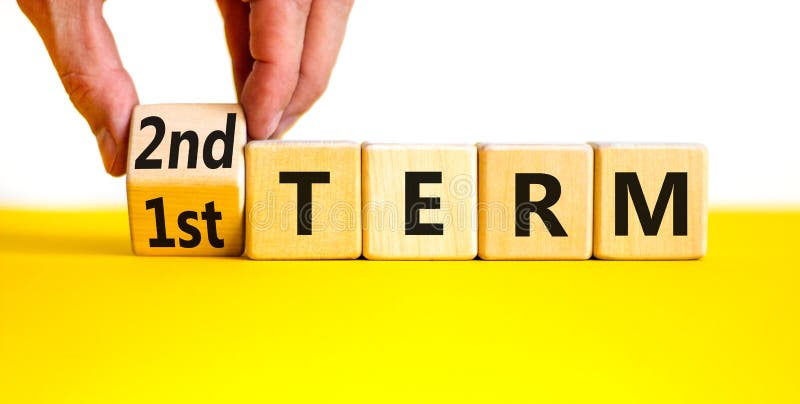 First or Second Term Symbol. Businessman Turns a Cube and Changes Words ...