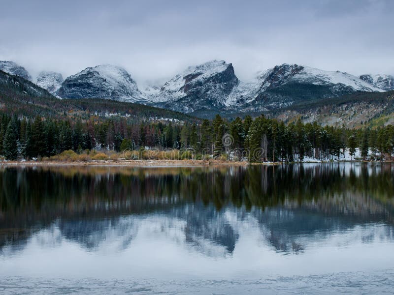 First Snow stock photo. Image of reflection, lake, green - 21899110