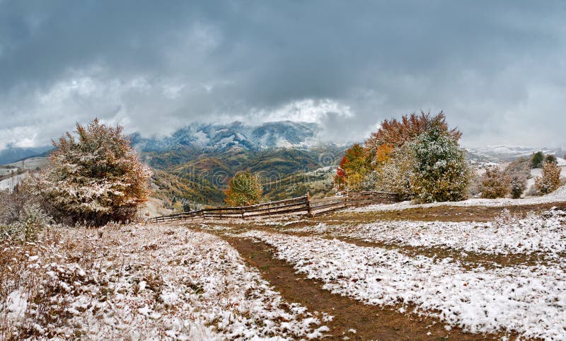First Snow in Autumn. Snowfall in Mountain Village Stock Image - Image ...