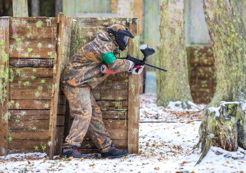 First Snow and Paintball Game Stock Image - Image of bright, male: 48229719