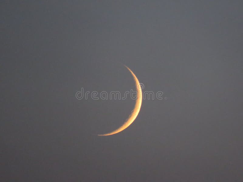 First Stage of the Crescent Moon Orange with the Setting Sun Stock ...