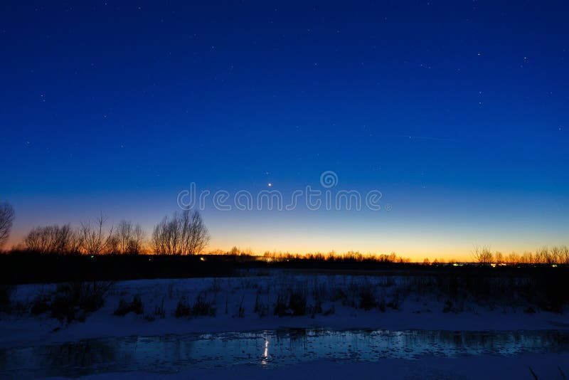 First Stars in the Background of a Bright Sunset. Stock Photo - Image ...