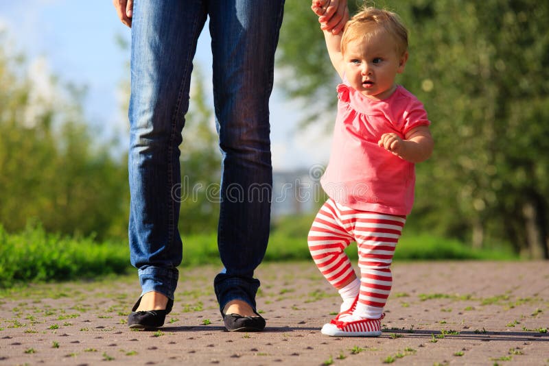 First Steps of Little Girl in Park Stock Image - Image of people ...