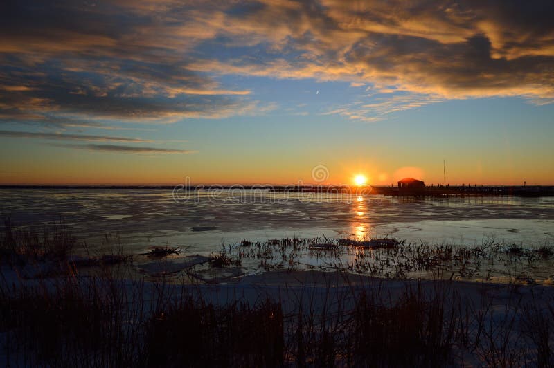 First Sunrise stock image. Image of michigan, clouds - 83574111