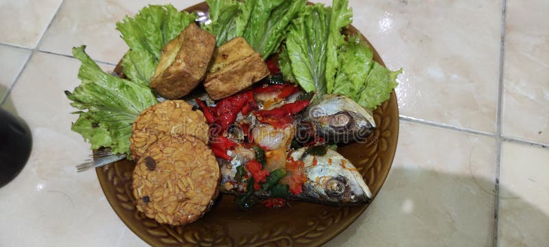 First Time Cooking Fried Spicy Fish with Topping Tempeh & Tofu Stock ...