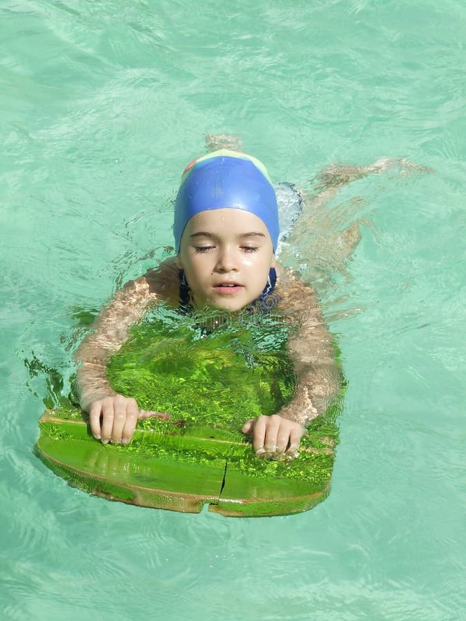First time swimming stock image. Image of young, swim - 4699759