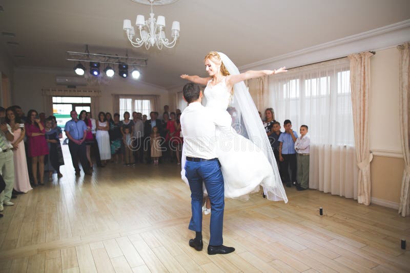 First Wedding Dance of Newlywed Couple in Restaurant Stock Photo ...