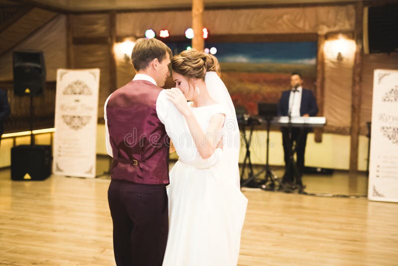 First Wedding Dance of Newlywed Couple in Restaurant Stock Photo ...