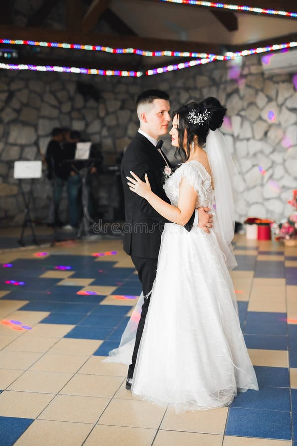 First Wedding Dance of Newlywed Couple in Restaurant Stock Photo ...