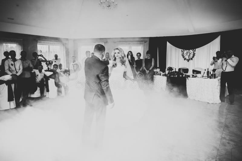 First Wedding Dance of Newlywed Couple in Restaurant Stock Photo ...